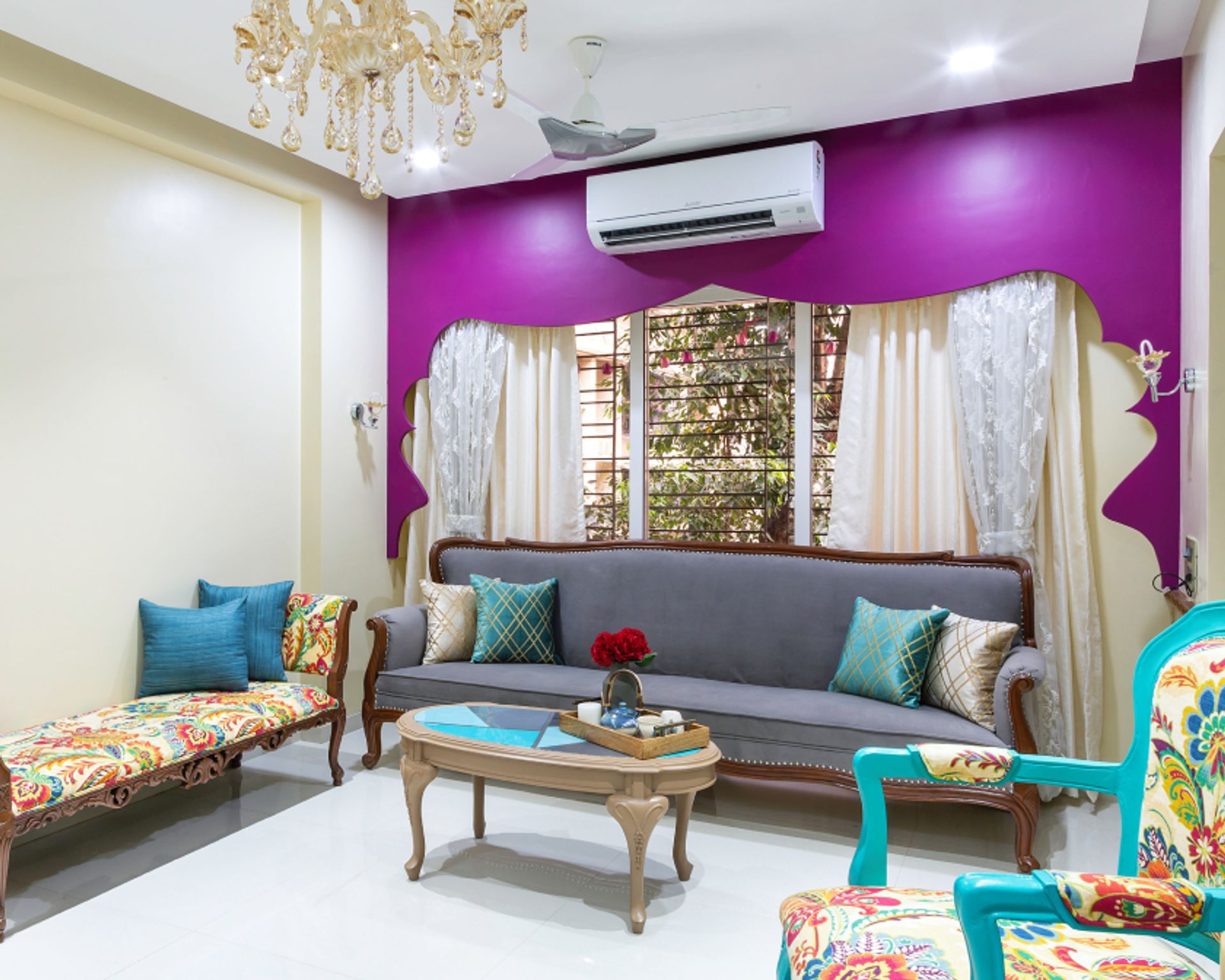 Compact Drawing Room Design With Colourful Seating | Livspace