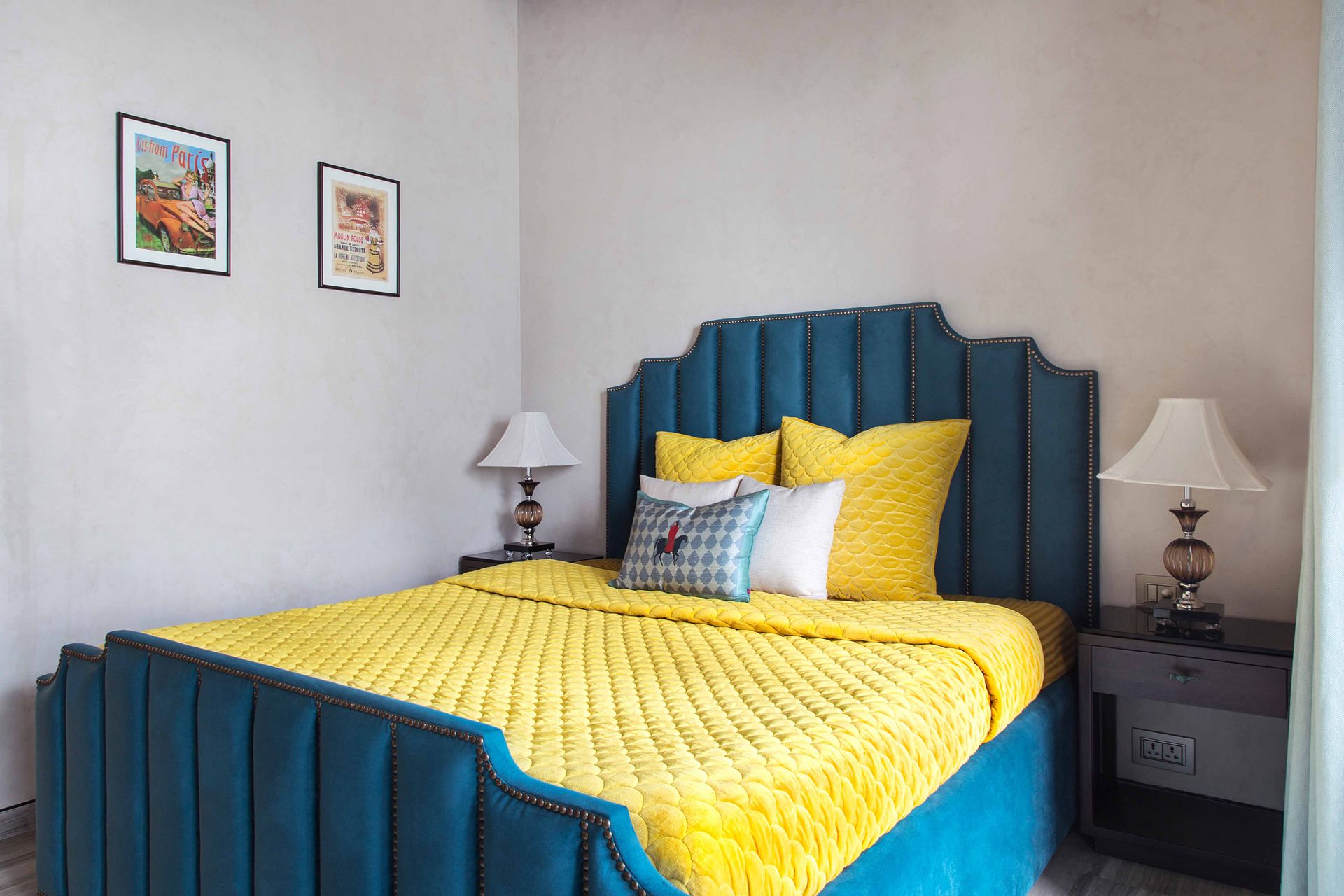 Guest Room Design With Dark Blue Headboard And Grey Textured Wall ...