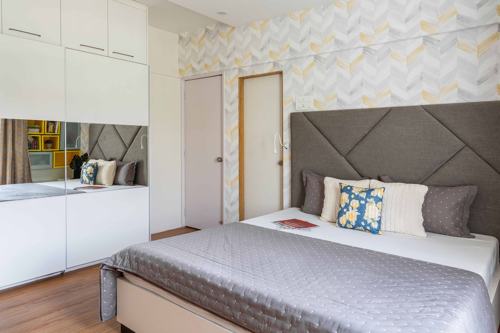 3-BHK Flat Design In Pune With Spacious Living Room Design And Blue Sofa Set | Livspace