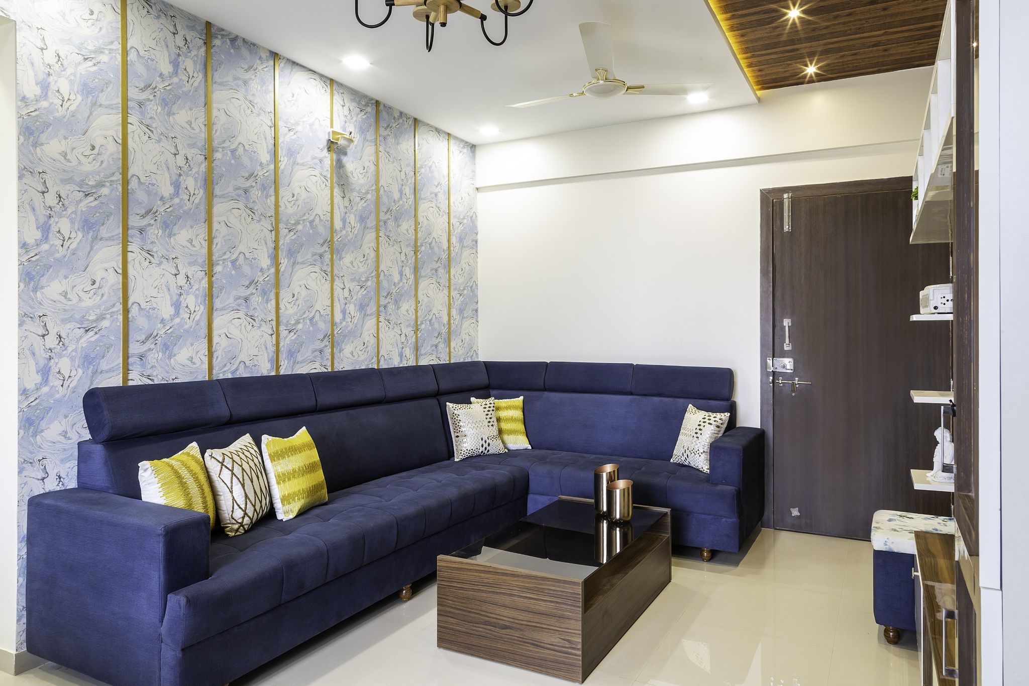 Central Drop False Ceiling Design With Dark Wooden Rafter And Cove ...