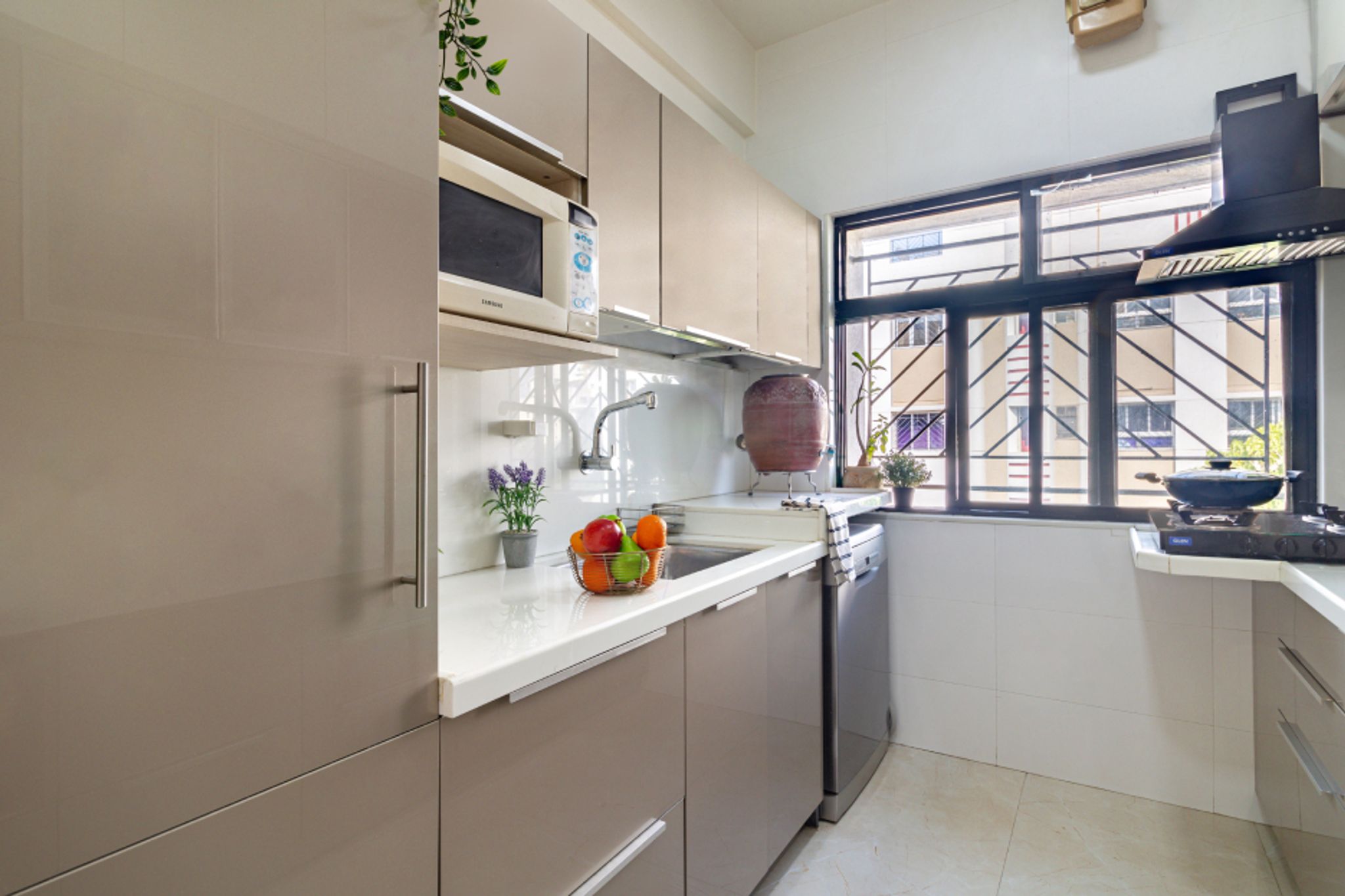 Kitchen Window Design With Fixed Glass And Sliding Shutters | Livspace