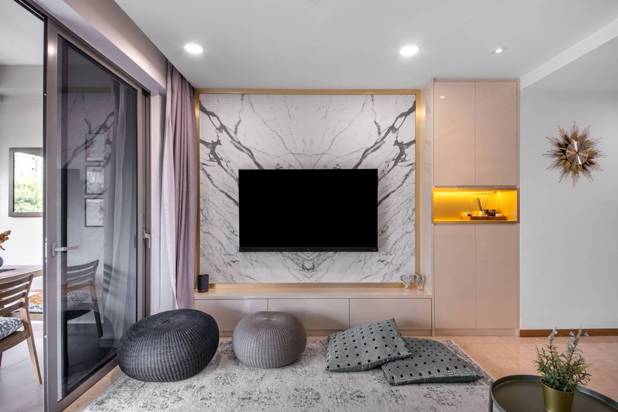 Neutral-Toned TV Unit With A Golden Frame | Livspace