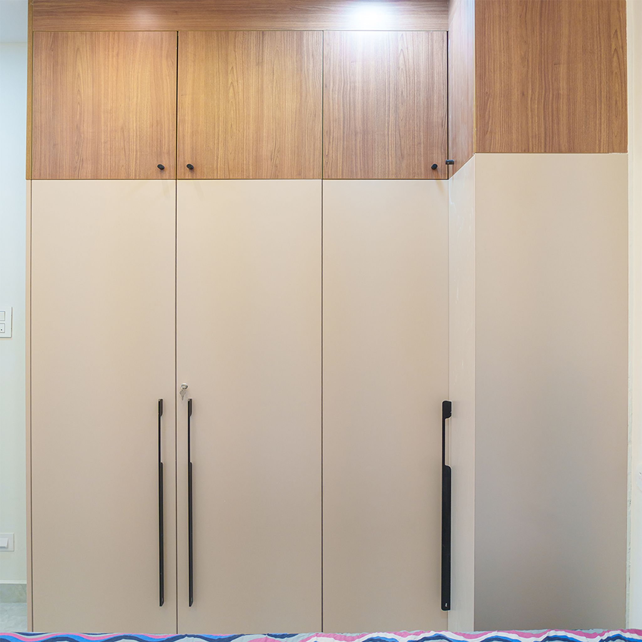 4-Door Contemporary Wardrobe Design With Vertical Storage | Livspace