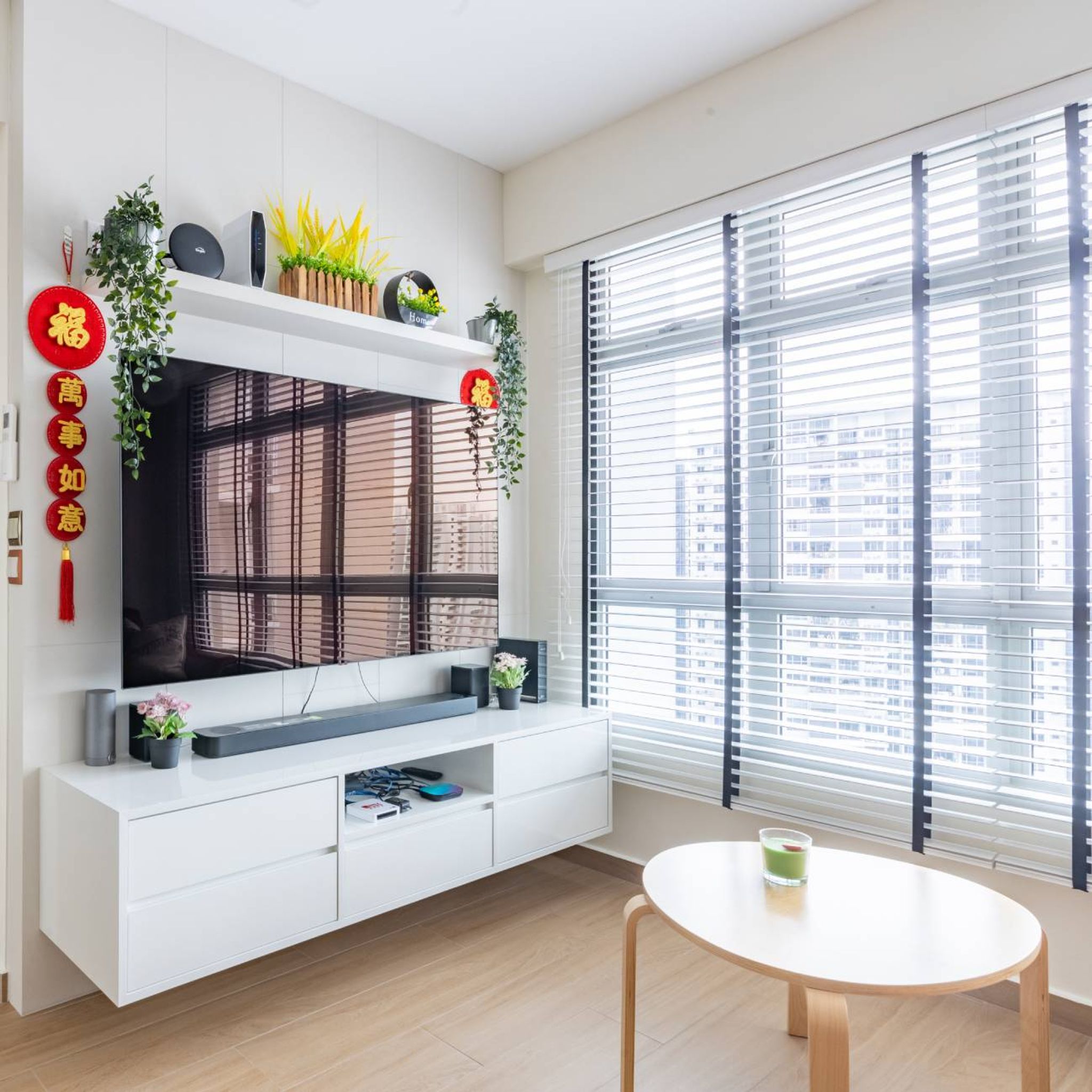 Wall-Mounted TV Cabinet Design With An Overhead Ledge | Livspace