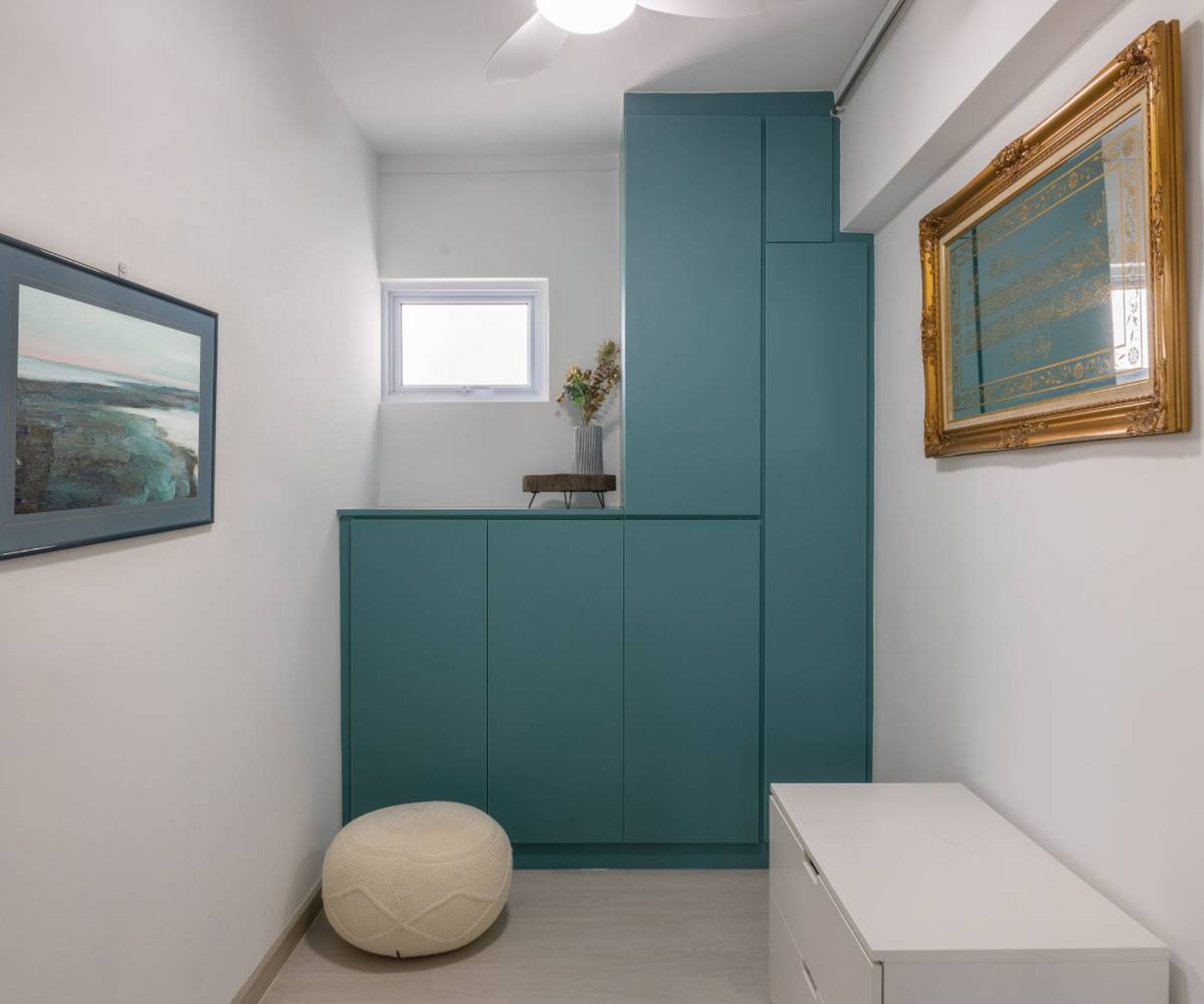 Turquoise And White Foyer Design With Storage Units | Livspace