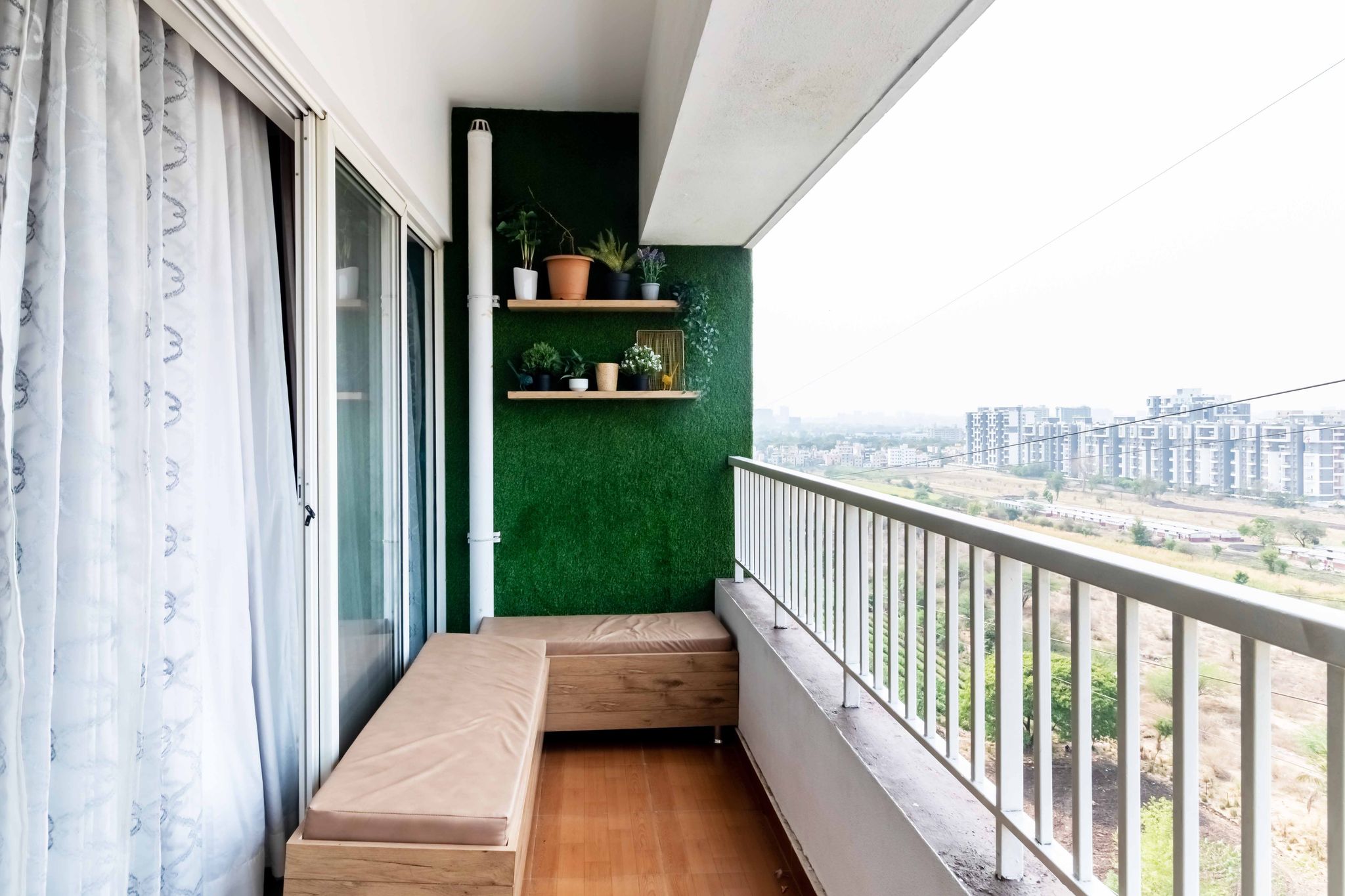 Compact Balcony Design With Grass Wall - 3X6 Ft | Livspace