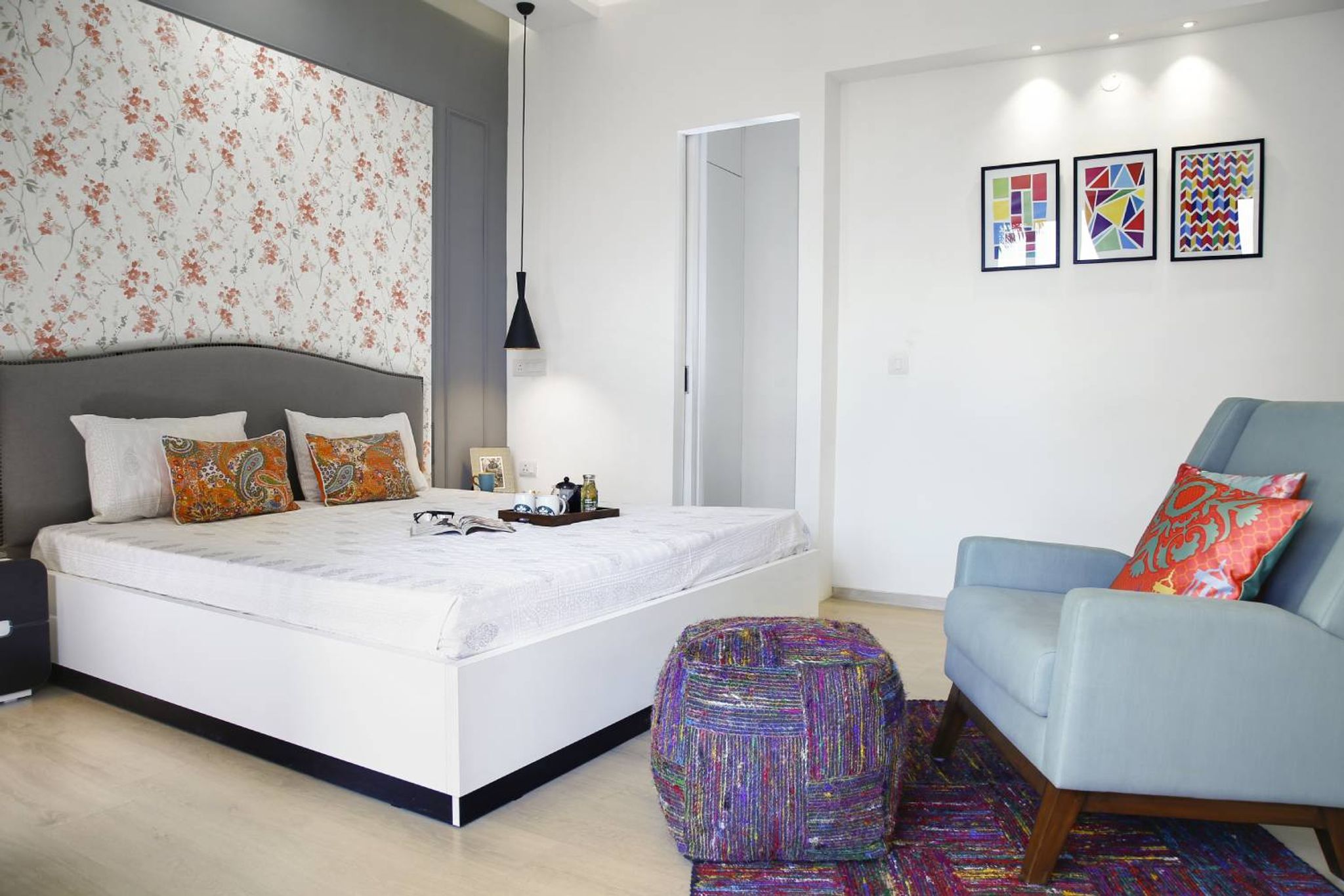 Gurgaon 2BHK Contemporary Flat Design with Printed Cushions and Dotted ...
