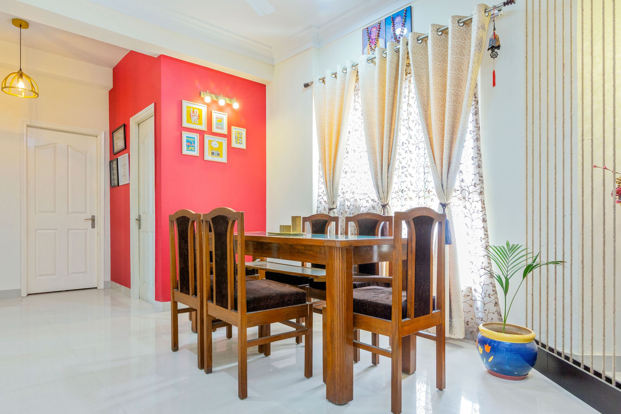 Dark Brown And Wood 6-Seater Dining Room Design With Red Accent Wall ...