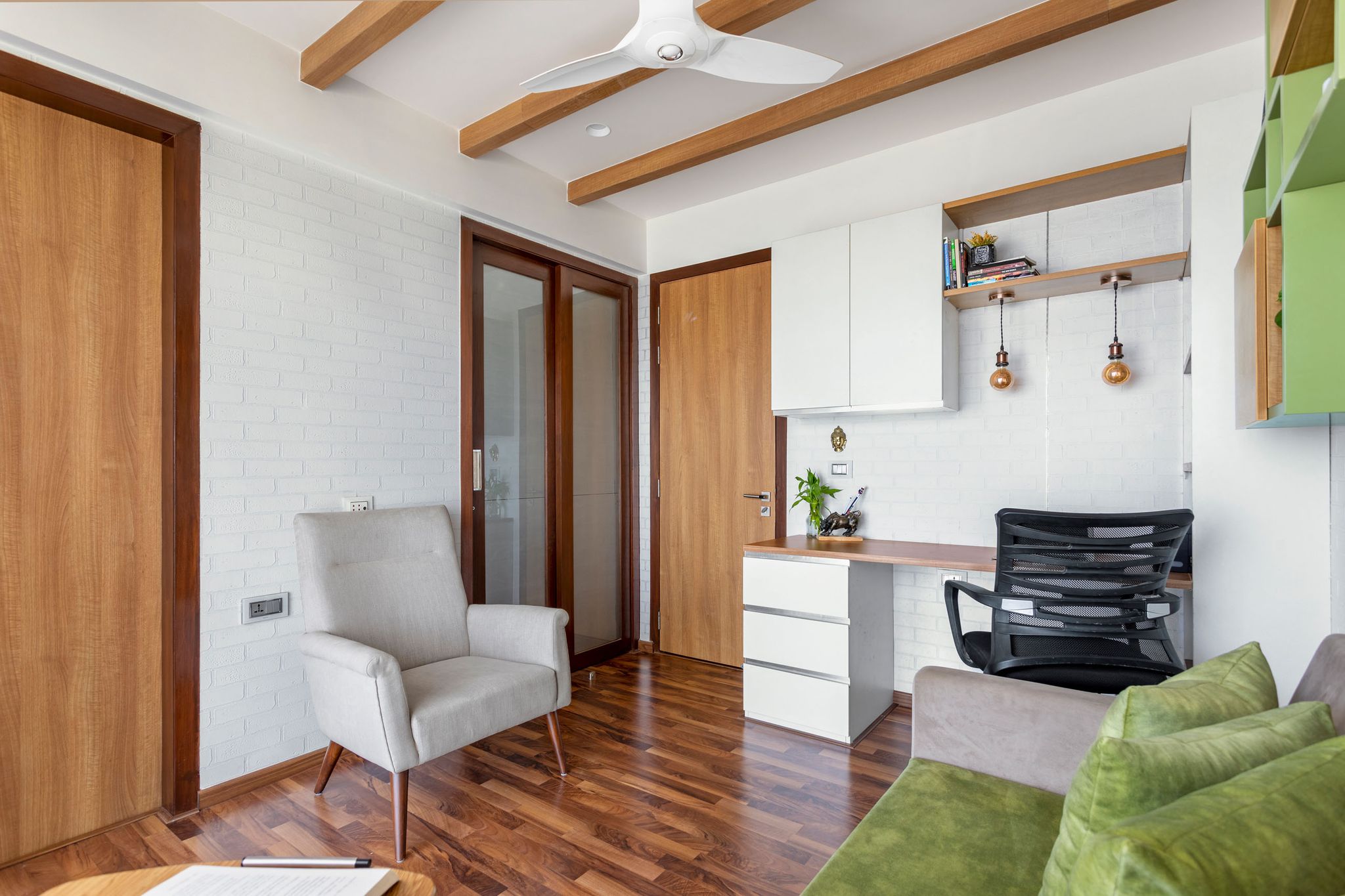 1-BHK Flat In Mumbai With Wooden Pooja Unit | Livspace