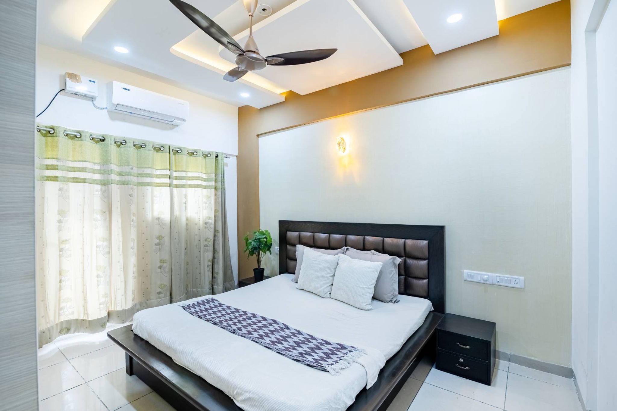Compact Guest Room Design With Multilayered False Ceiling | Livspace