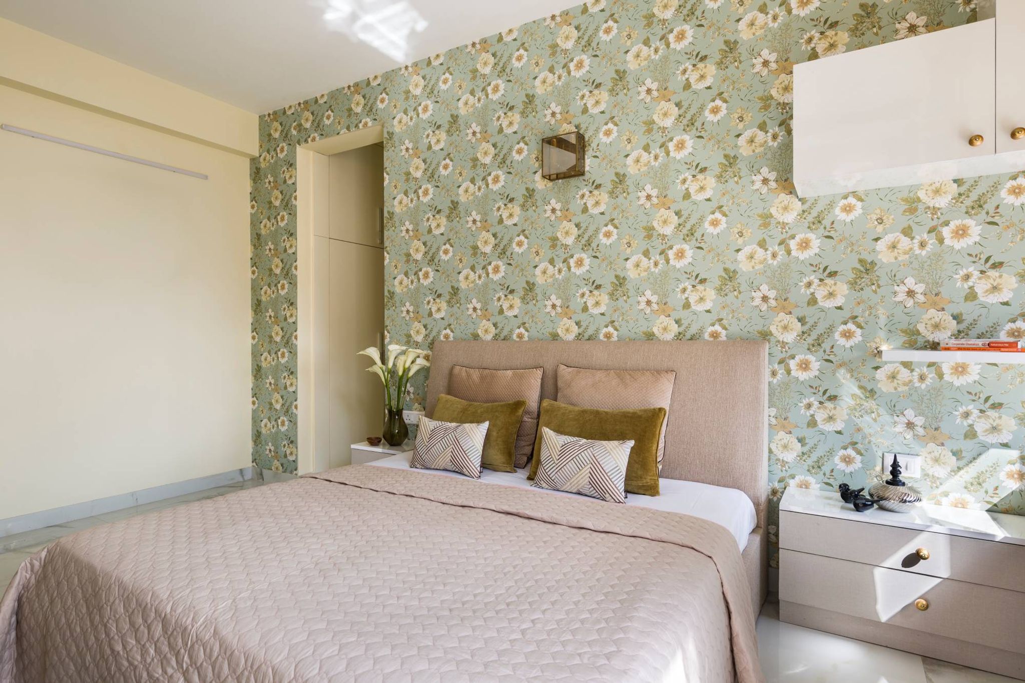 Spacious Guest Room Design With Pastel Floral Wallpaper | Livspace