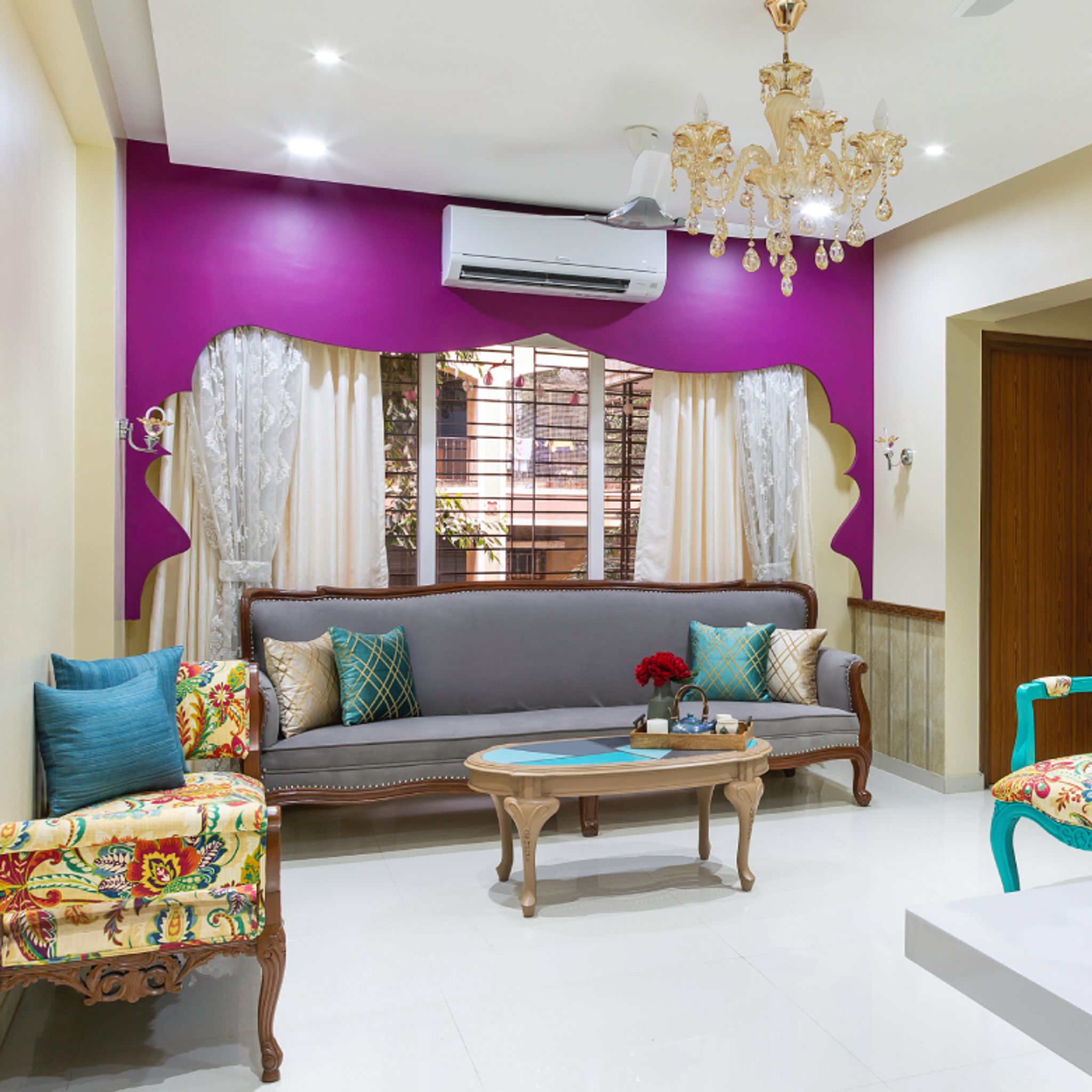 Compact Drawing Room Design With Colourful Seating | Livspace