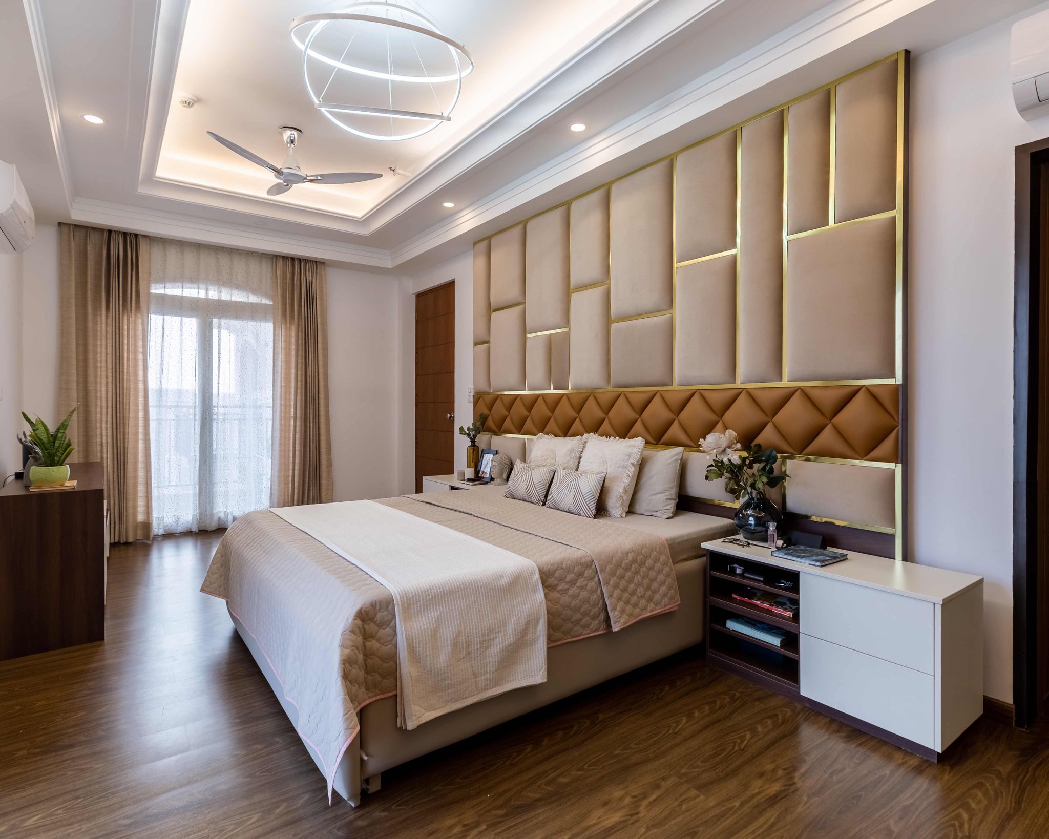 Bedroom Wall Design With A Metal Frame And Cushioned Panelling | Livspace