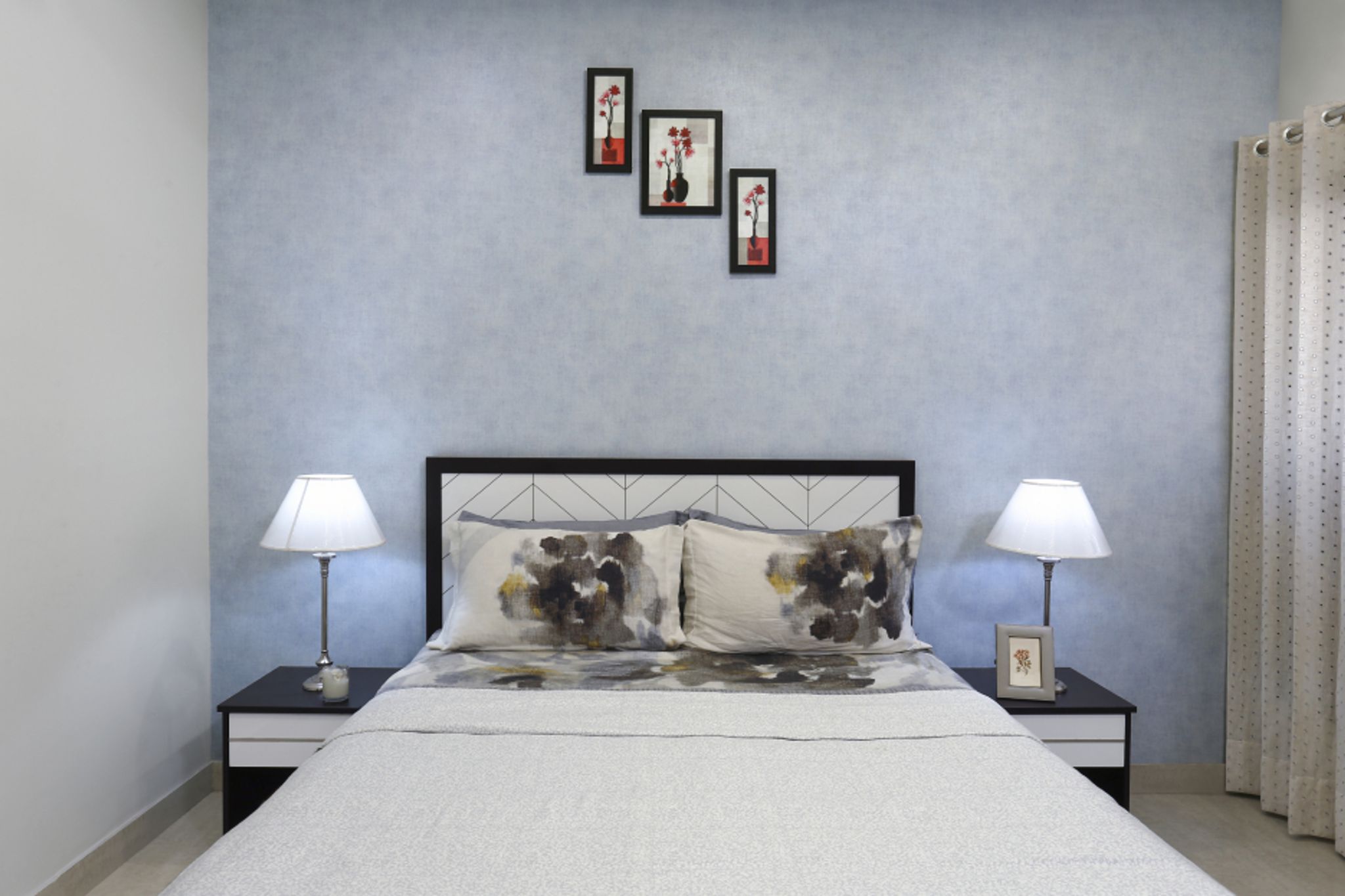 Blue Accent Wall Paint Design With A Textured Finish | Livspace