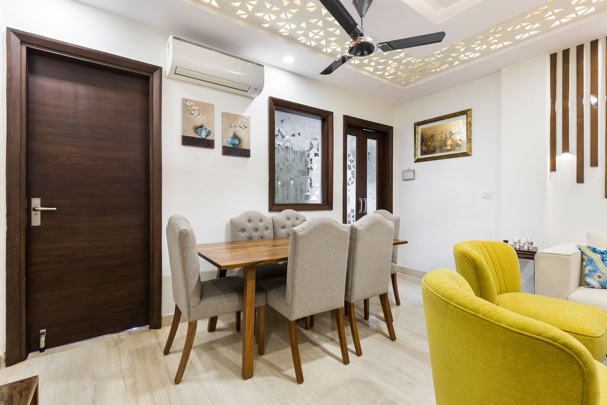 Delhi 3-BHK Interior Design With Colourful Living Room And Ornamental ...