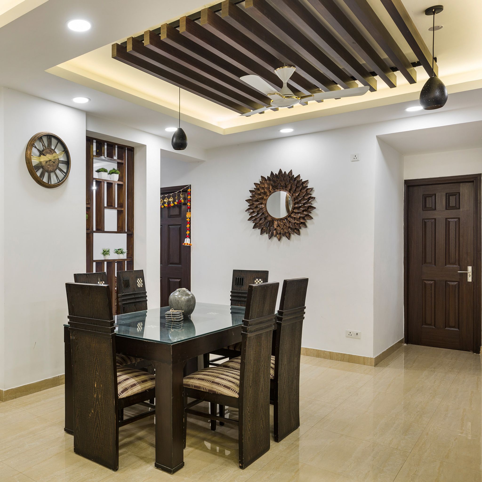 Noida 2-BHK Interior With Wood-Panelled Dining Room Ceiling Design ...