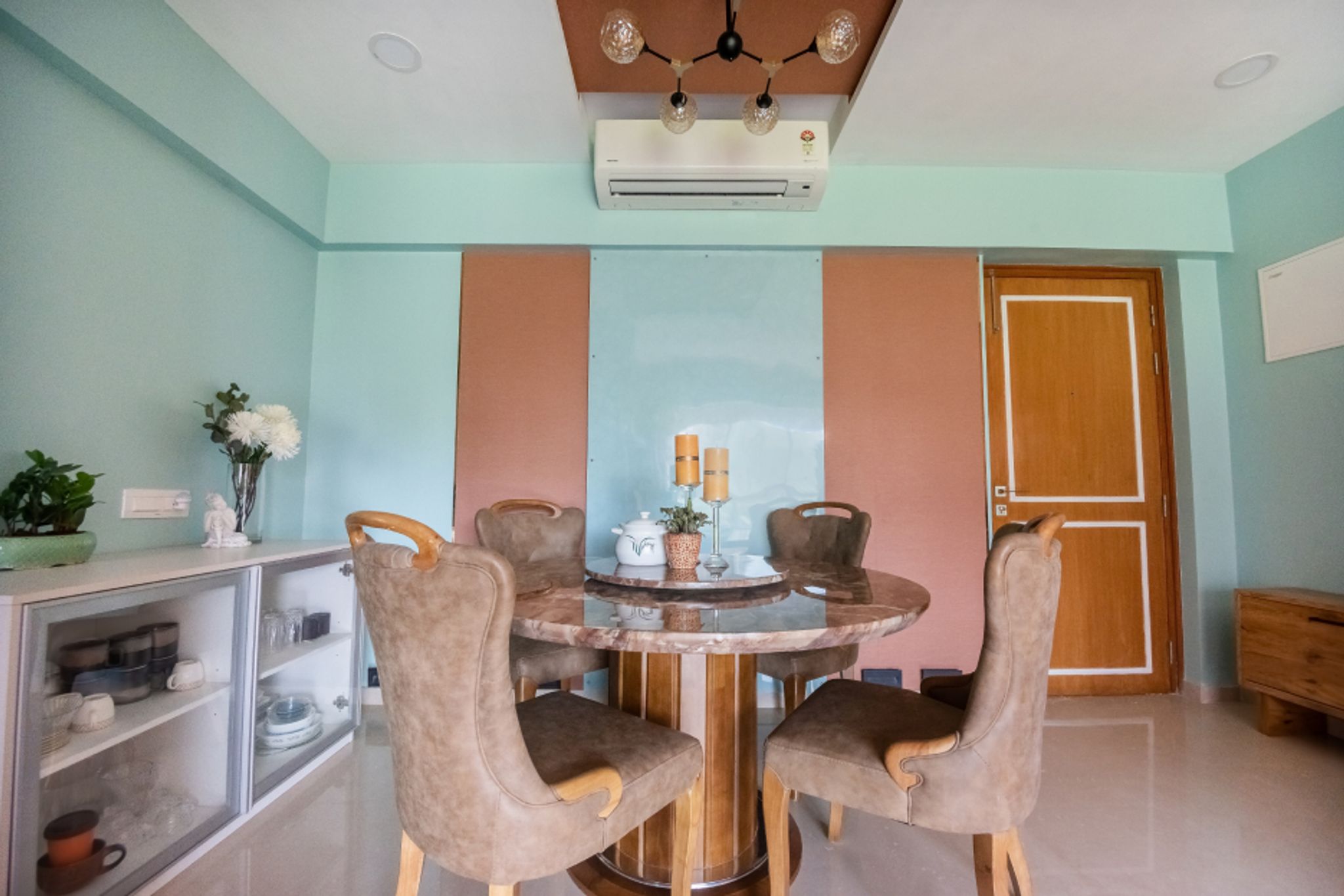 Compact Dining Room With Ambient Lighting | Livspace
