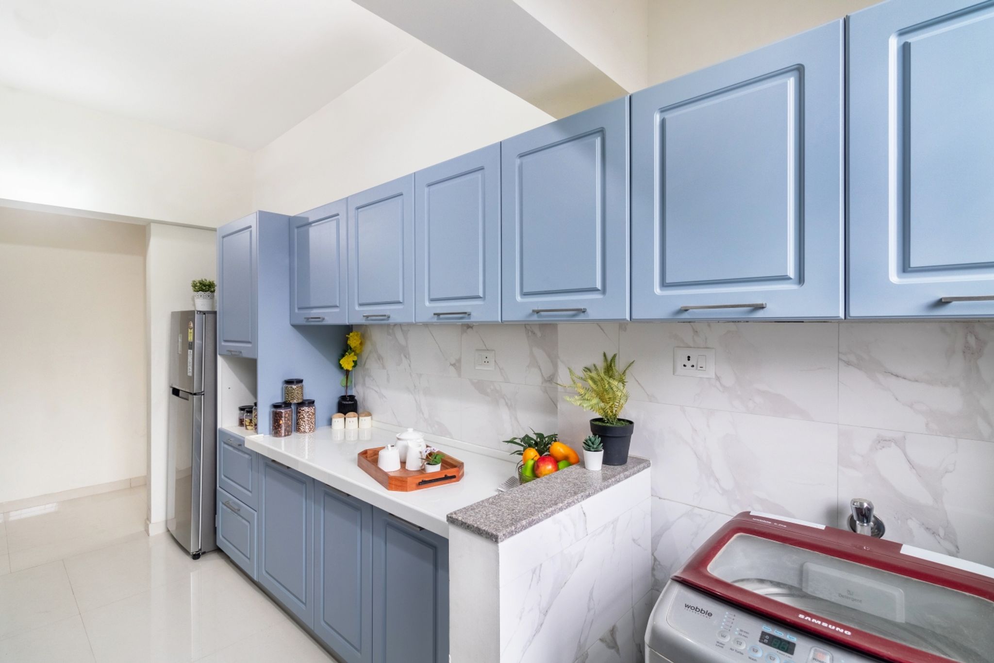 Blue Parallel Kitchen Design With Denim Suedette Cabinets | Livspace