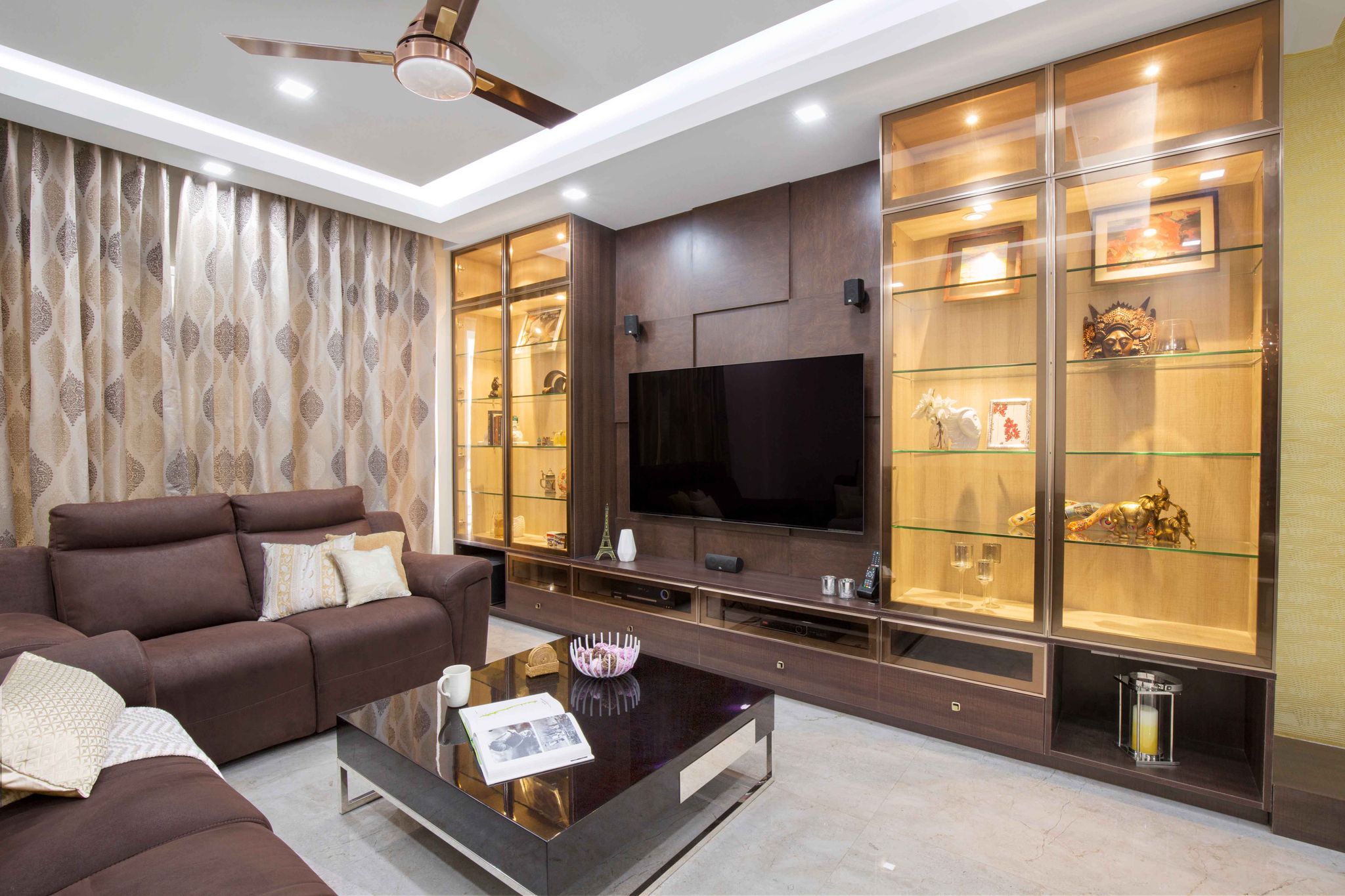 Floor-Mounted Wooden TV Unit Design With Glass Doors | Livspace