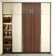 Spacious Wardrobe Design With Integrated TV Unit | Livspace
