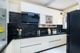 Modern Parallel Kitchen Design with Dark Grey Cabinets - 7x9 Ft | Livspace