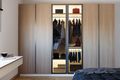 Monochromatic Contemporary Brown Wardrobe Design With Metal Handles ...