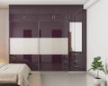 L-Shaped Wardrobe Design With Cove Lighting | Livspace