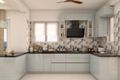 Contemporary Modular Kitchen Design With Dado Tiles | Livspace