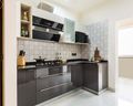 L-Shaped Modern Modular Kitchen Design With Aubergine Toned Cabinets ...
