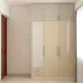 Dual Tone Sliding Door Modern Wardrobe Design with Loft | Livspace