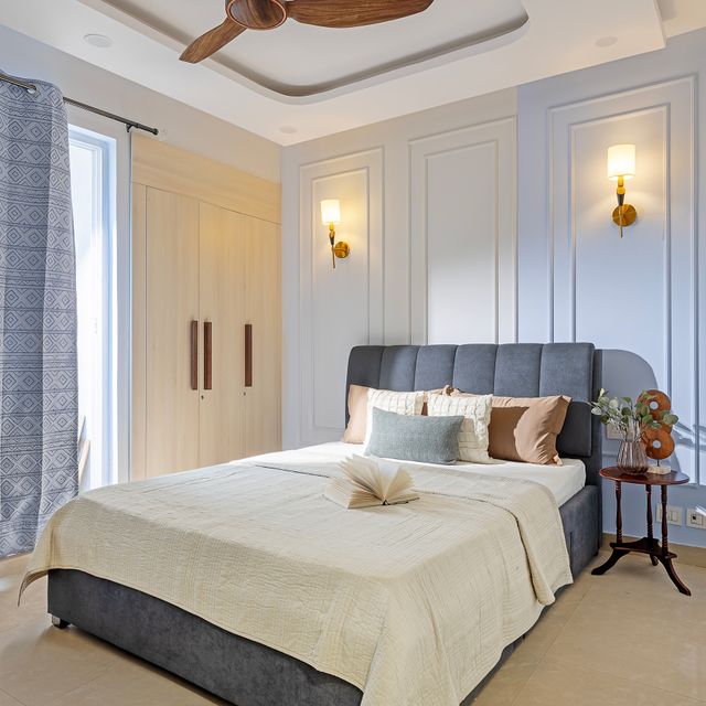 Guest Bedroom Design with Built-In Wardrobe and Upholstered Bed | Livspace