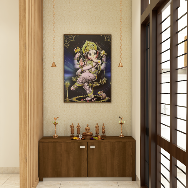 Compact Pooja Room Design With Golden Bells | Livspace