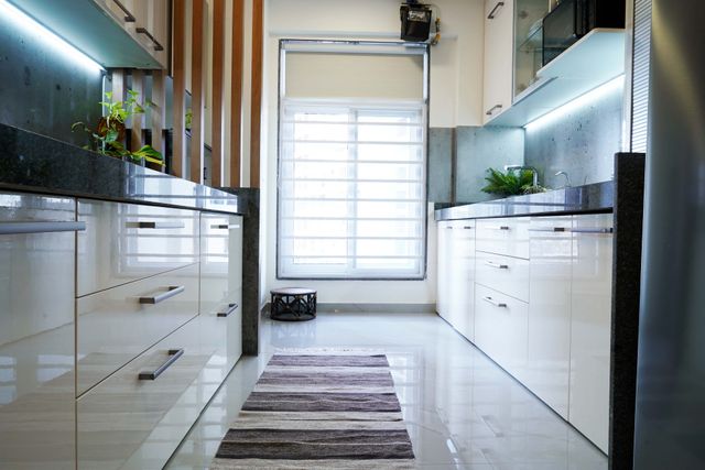 2-BHK Flat In Mumbai With Glossy Parallel Kitchen Design | Livspace