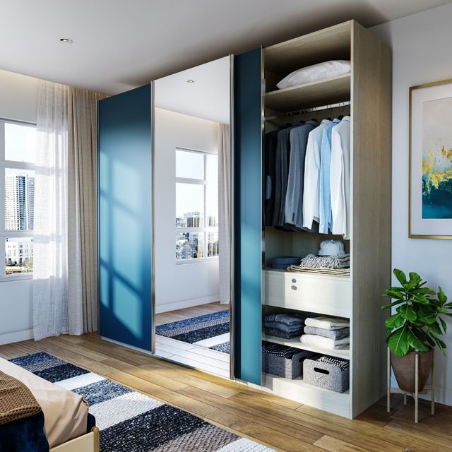 3-Door Blue Space Saving Sliding Wardrobe Design With Mirror | Livspace