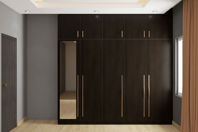 Spacious Wardrobe Design In Brown Laminate Shutter | Laminate