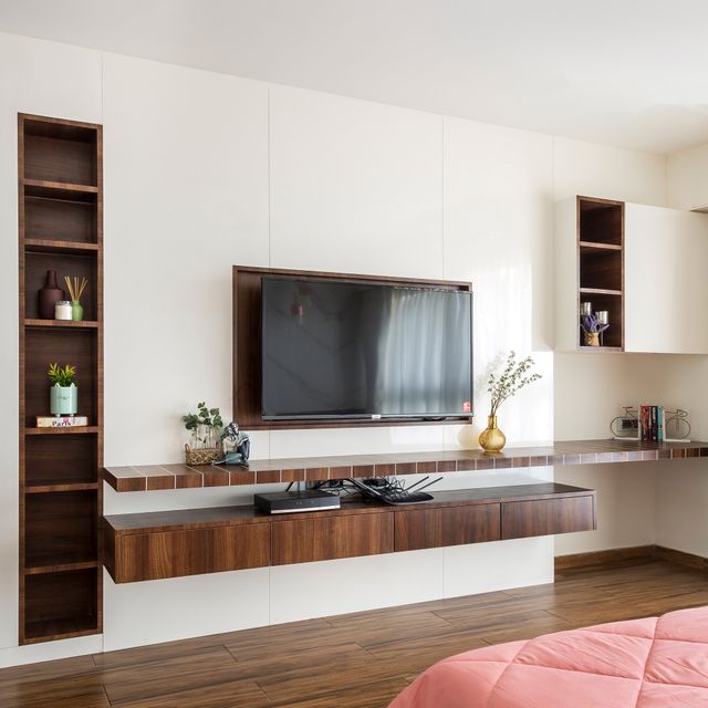 Wooden TV Unit Design With Wall-Mounted Storage Units | Livspace