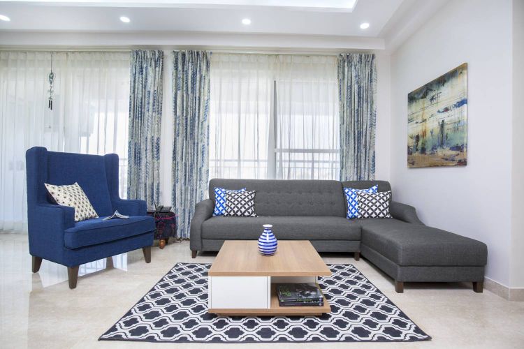 Contemporary 3BHK Bangalore Flat Design with Colorful Wallpapers | Livspace