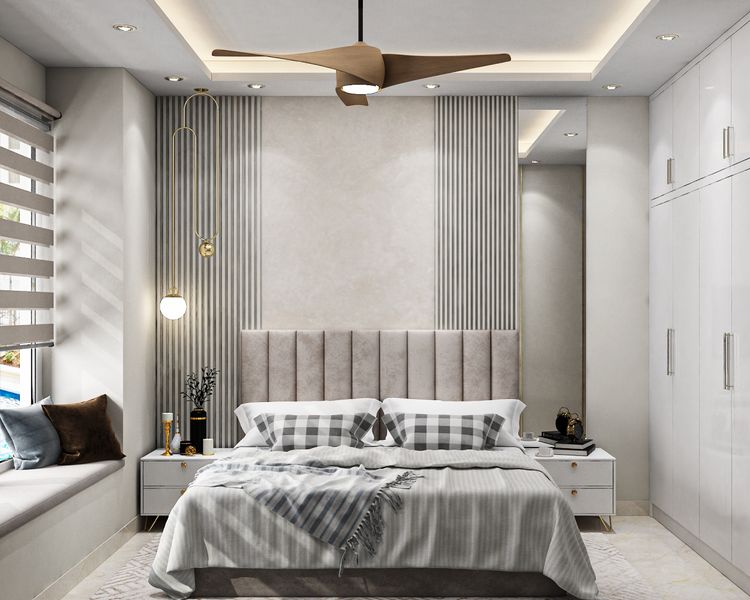 Spacious Modern Master Bedroom Design with Tufted Headboard and Fluted Wall Panels | Livspace