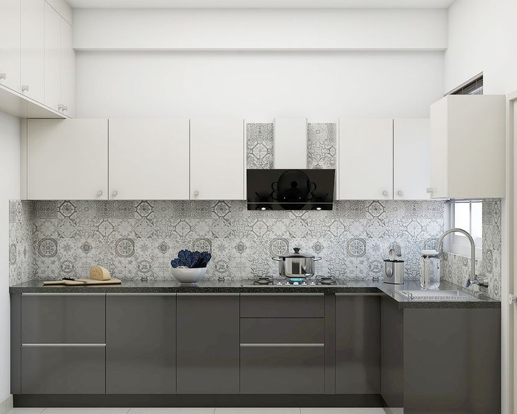 Compact L-Shaped Kitchen Design With Grey And White Cabinets | Livspace