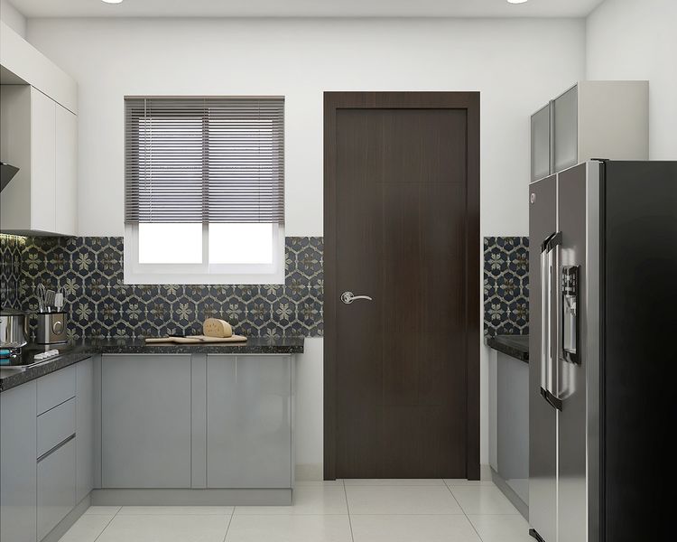 Compact Grey Kitchen Design With Black Patterned Dado Tiles | Livspace