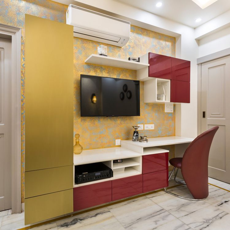 Nomadic Gold And Red TV Unit Design With Overhead Unit | Livspace