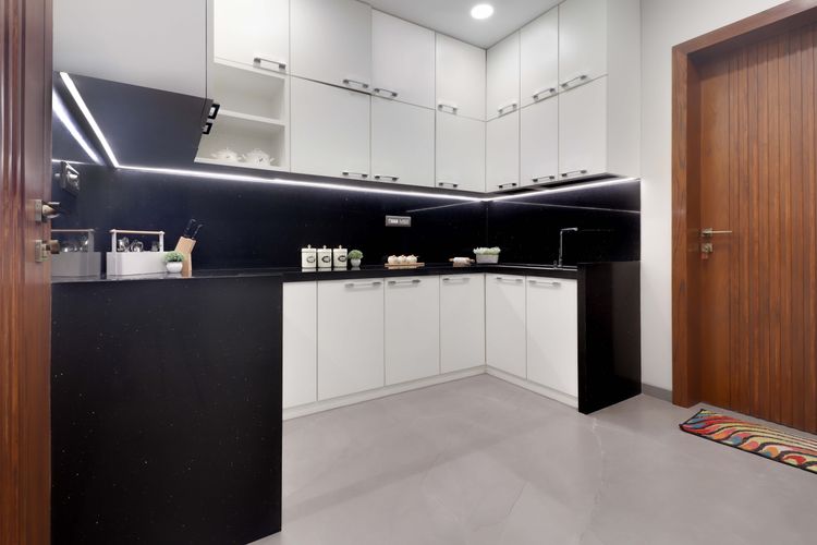 Spacious Modular Kitchen Design With Loft Storage | Livspace