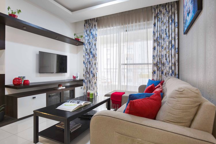 Bangalore 2-BHK Apartment Interior Design With White And Red Glossy L-Shaped Kitchen | Livspace