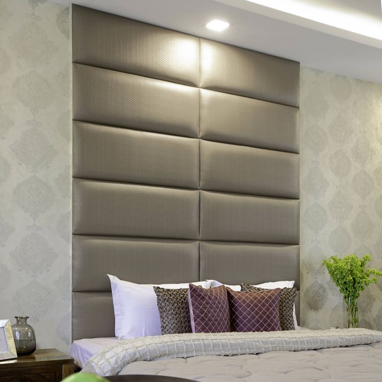 Spacious Guest Room Design With Floor-To-Ceiling Headboard And Floral ...