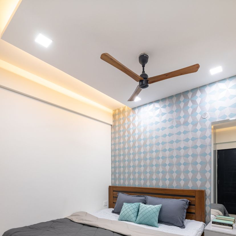 Modern False Ceiling With Blue Wallpaper | Livspace