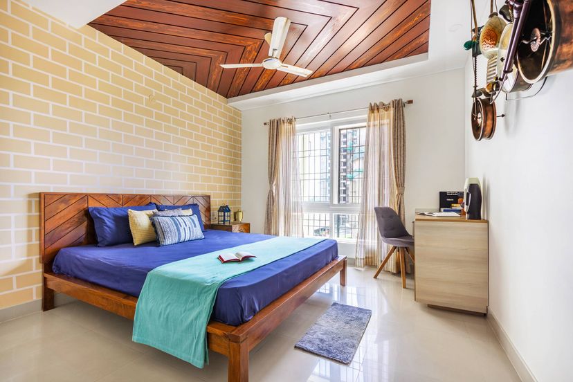 Single Layered False Ceiling With Chevron Wood Panels | Livspace