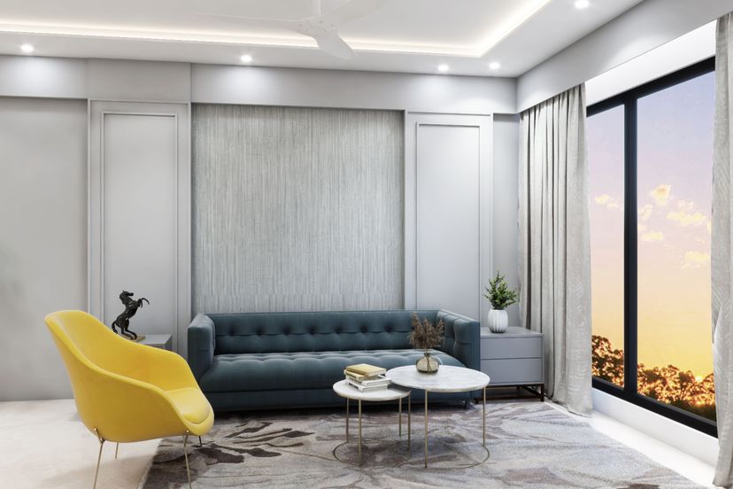 Spacious Living Room Design With Blue Chesterfield Sofa | Livspace