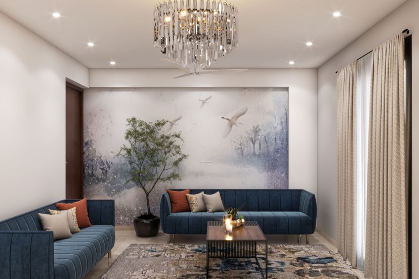 Spacious Living Room Design With Blue Sofas | Livspace
