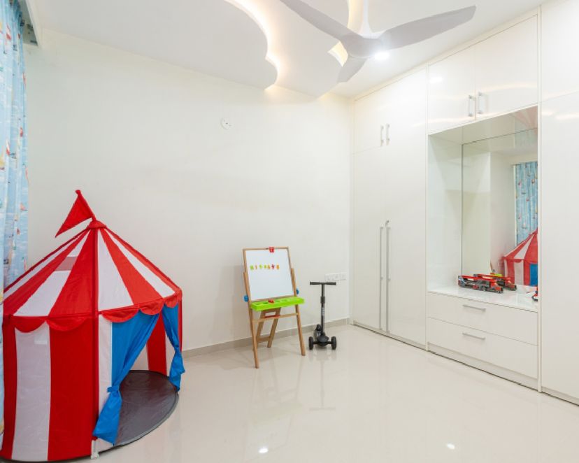 Cloud-Shaped Ceiling Design With Cove Lights | Livspace