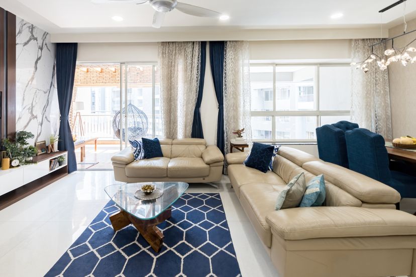 White And Blue Spacious Drawing Room Design | Livspace